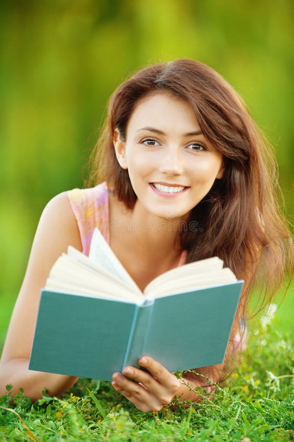 Girl-student Read a Textbook. Stock Photo - Image of blurred, grass ...