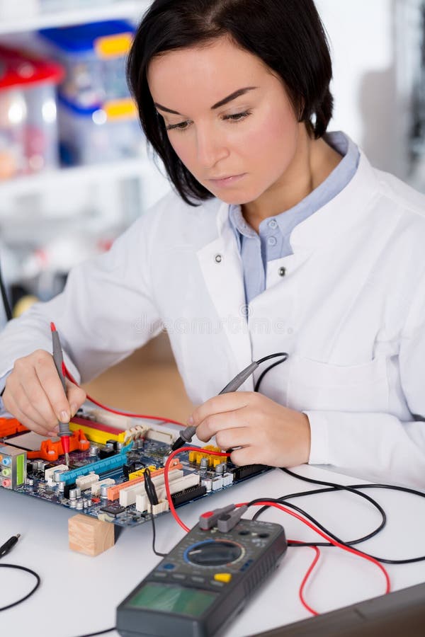 Girl Student Studying Electronic Device with a Microprocessor Stock ...