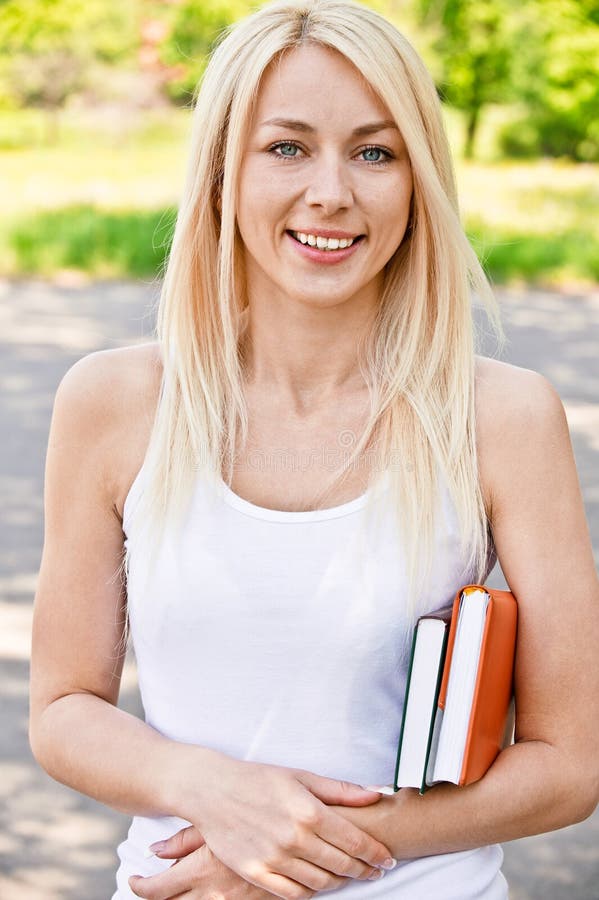 Girl-student with textbook stock image. Image of hair - 14570971