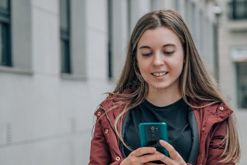 Girl or Student in the Street with Mobile Phone Stock Photo - Image of ...