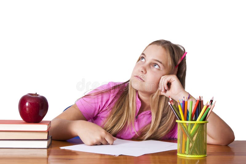 Girl studying at the desk stock photo. Image of assignments - 77569750