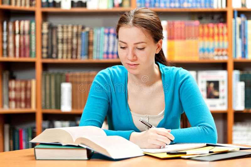 Girl studying in library stock photo. Image of concentration - 25103470
