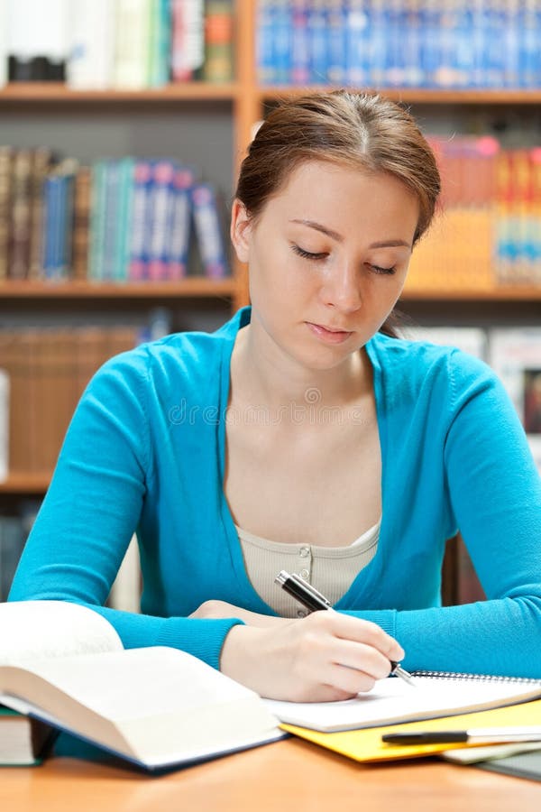 Girl studying in library stock photo. Image of concentration - 25103470