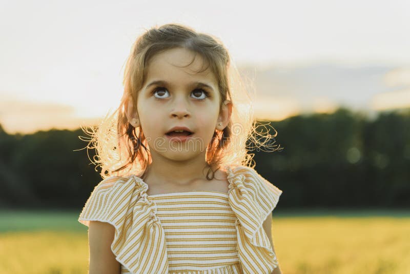 Girl in the Sunlight in the Field Stock Photo - Image of meadow, glow ...