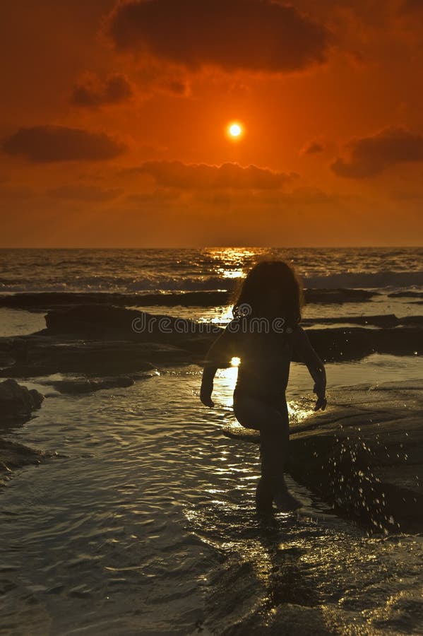 Girl sunset stock image. Image of enjoyment, coast, background - 5624403