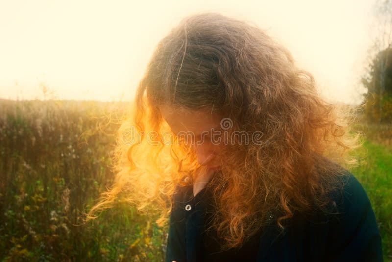 Girl in the sunset rays stock image. Image of background - 9209481