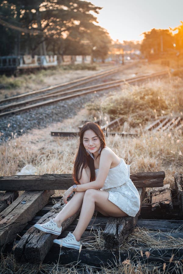 Girl at sunset stock photo. Image of leisure, cute, sand - 85531946