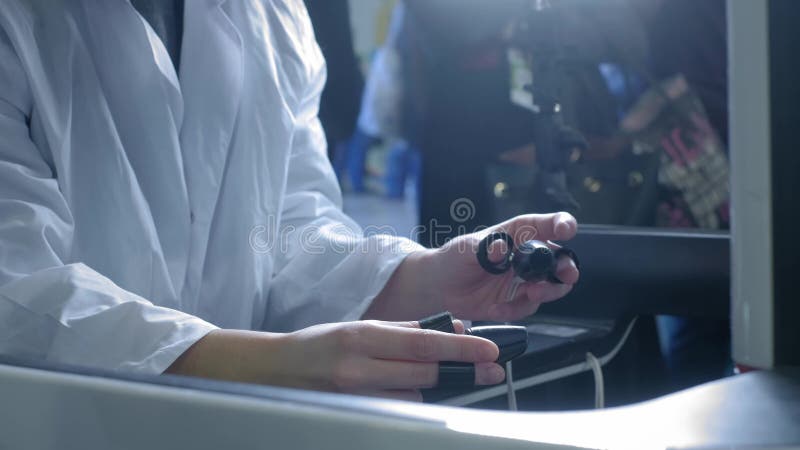 A Girl Surgeon Performs an Operation on a Patient in Virtual Reality ...