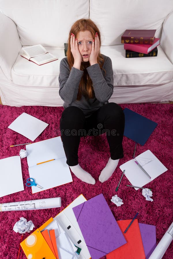 Girl Surrounded by Schoolwork Stock Image - Image of focused, notes ...