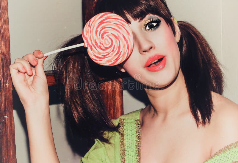 Girl with sweets stock image. Image of ponytail, style - 53346023