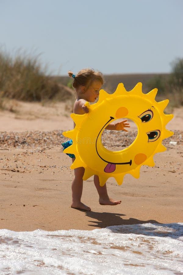 Girl with swimming circle stock photo. Image of people - 10939206