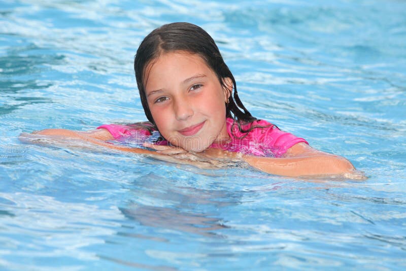 Girl in a swimming pool stock image. Image of blue, lifestyle - 48673785