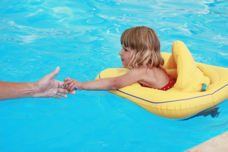 Girl Swims in a Pool with a Circle Stock Photo - Image of learning ...