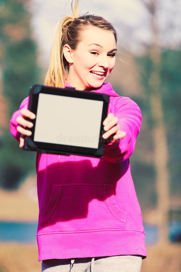 Girl with tablet in park. stock photo. Image of technology - 74469996
