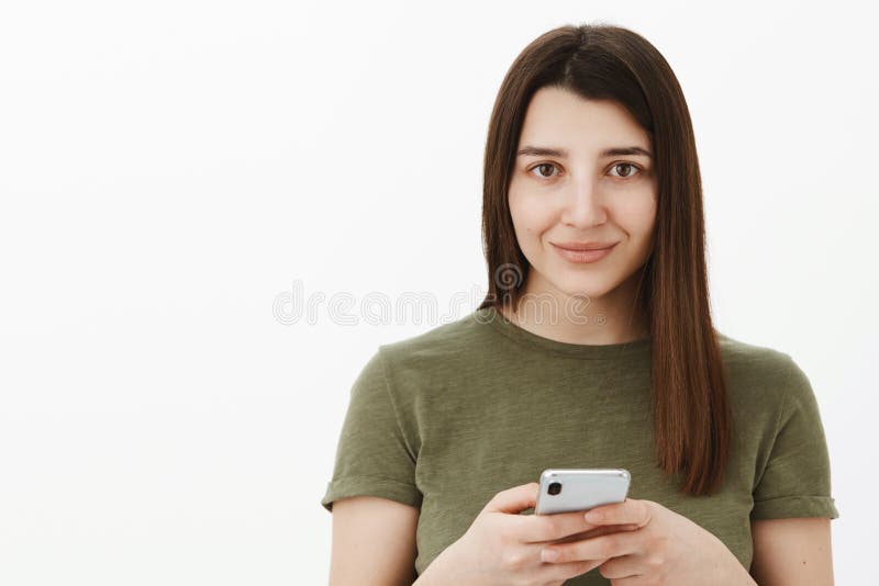 Girl Taking Notes in Smartphone Looking Ready and Positive at Camera ...