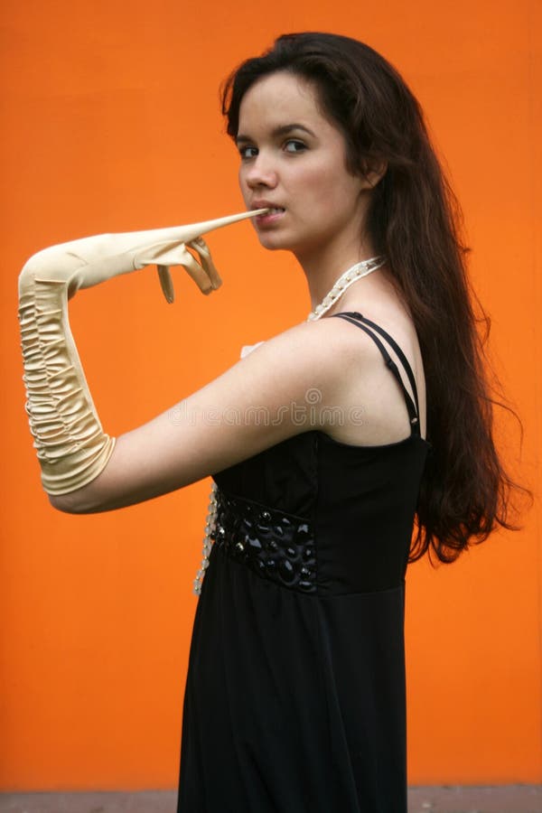 Girl taking off her glove stock photo. Image of fashionable - 10724026