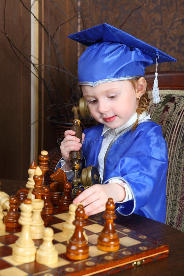 Girl Talking on the Phone while Playing Chess Stock Photo - Image of ...