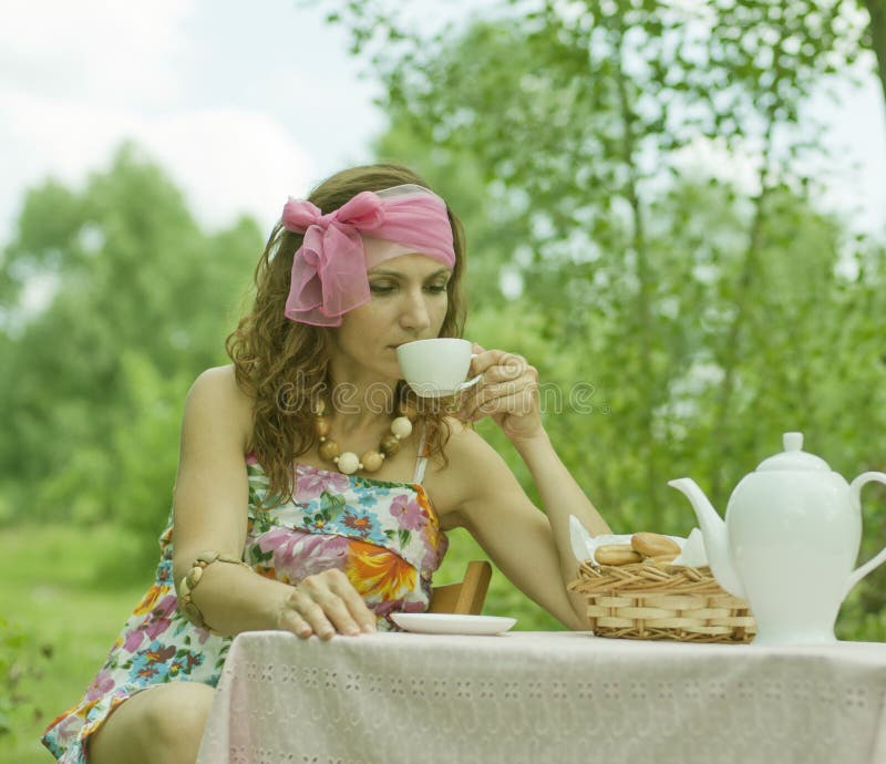 Girl and tea stock photo. Image of weather, relax, summer - 25240746