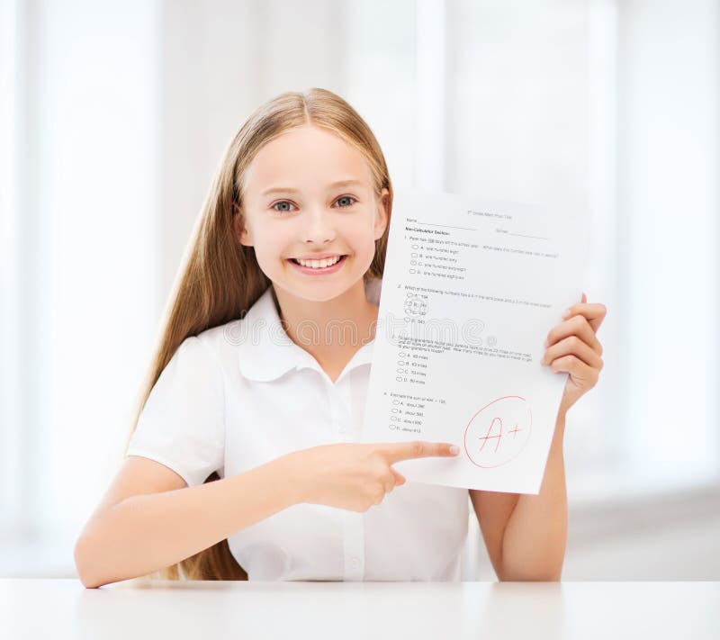 Girl with Test and a Grade at School Stock Image - Image of cheerful ...