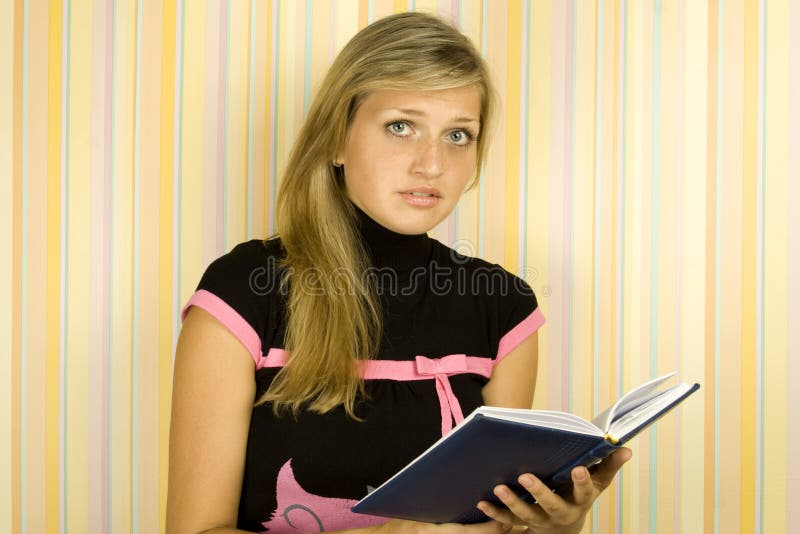 Girl with textbook stock image. Image of adult, beauty - 15812005
