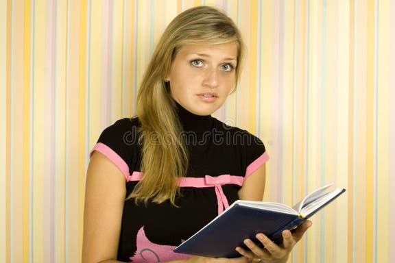 Girl with textbook stock image. Image of adult, beauty - 15812005