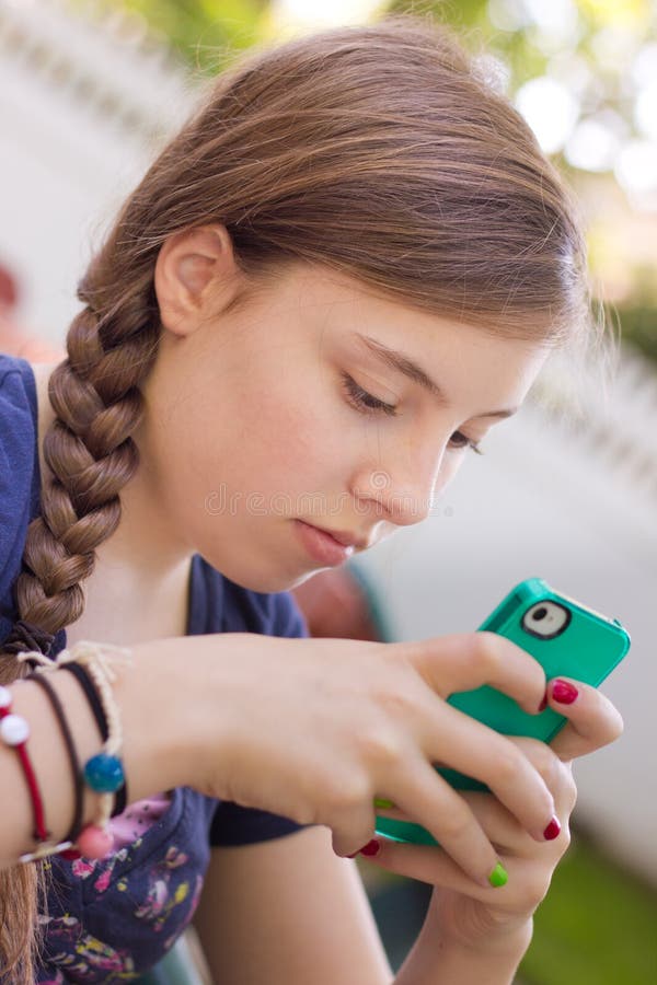 Girl texting on Phone stock photo. Image of messaging - 26718694 Girl texting on Phone stock photo. Image of messaging - 26718694