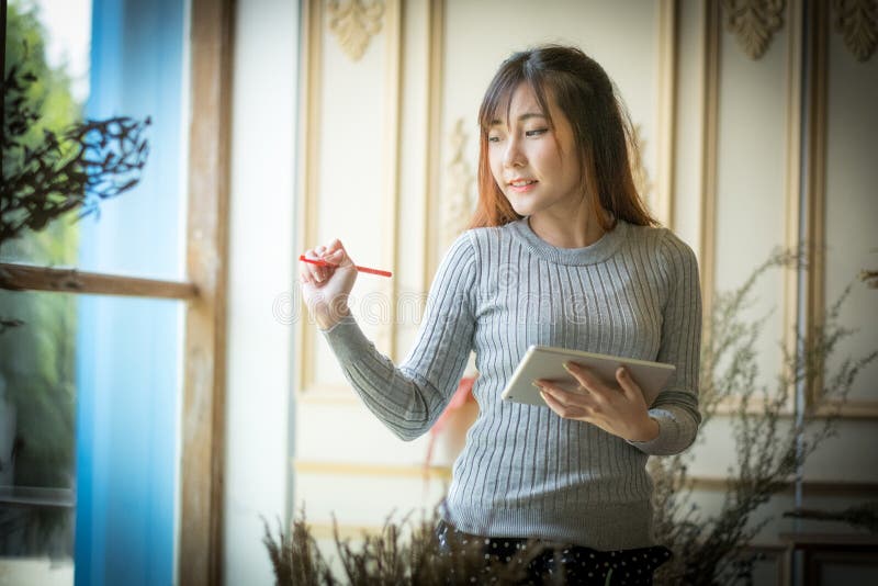 The Girl Texting on the Tablet Computer ,with Space for Text Ads Stock ...