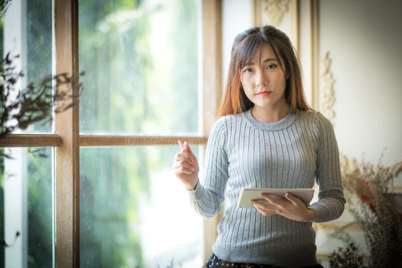 The Girl Texting on the Tablet Computer ,with Space for Text Ads Stock ...