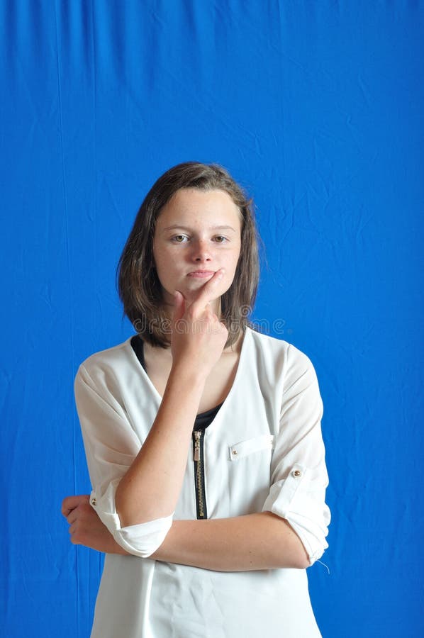 Girl Thinking on Blue Background Stock Image - Image of female ...
