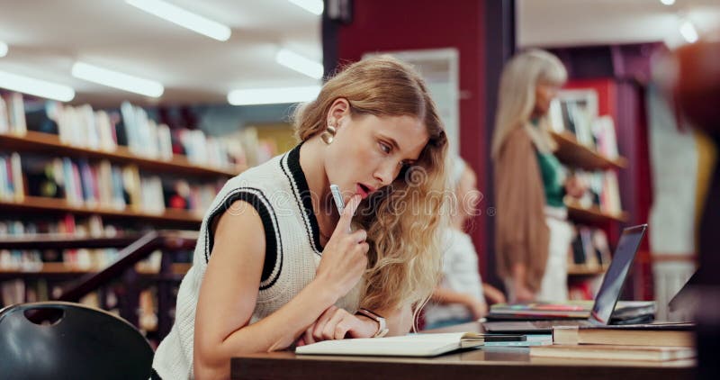 Girl, Thinking and Writing with Laptop in Library for Assessment ...