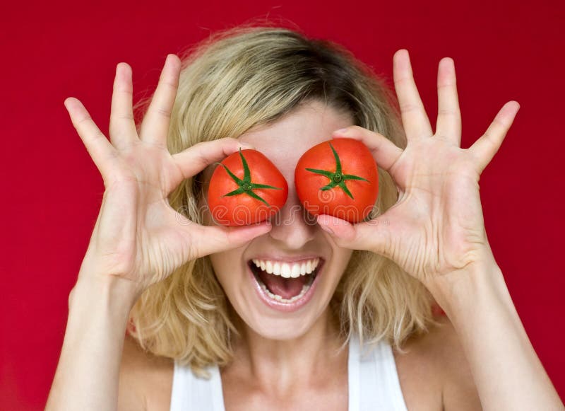 Girl with tomatoes stock photo. Image of color, dieting - 26877330