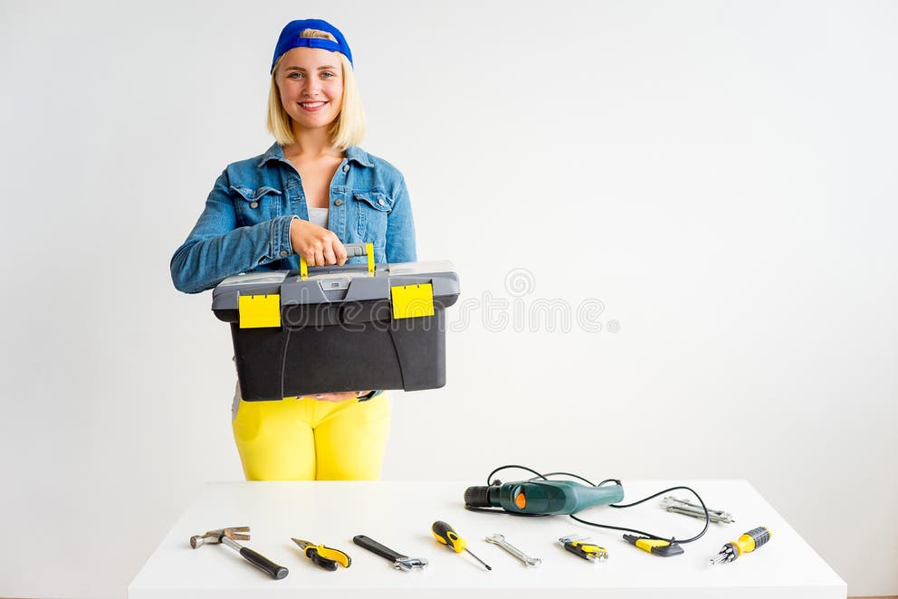 Girl with tools stock image. Image of female, person - 104004025