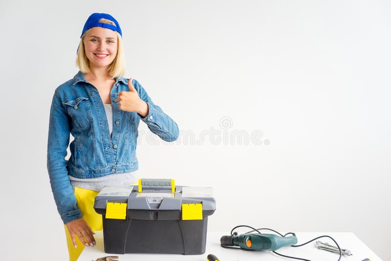 Girl with tools stock image. Image of apartment, lady - 104004193