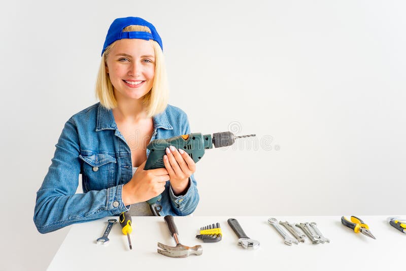 Girl with tools stock image. Image of attractive, people - 104005155