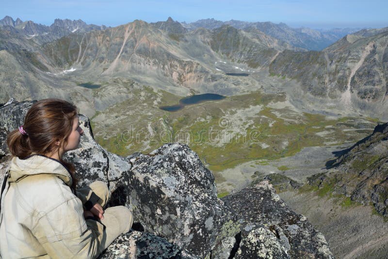 Girl on the Top of a Cliff, Looking Over the Valley and Lake Stock ...