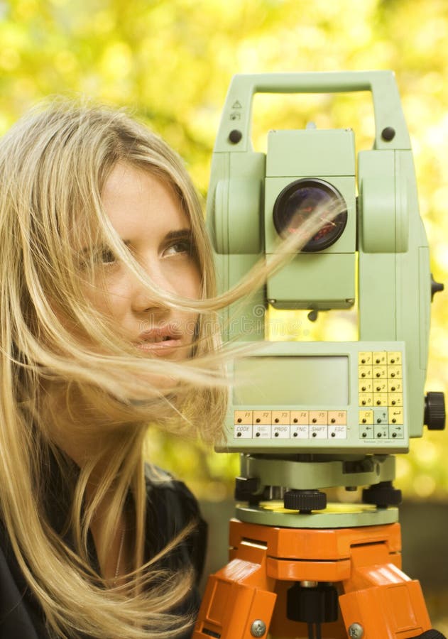 Girl and Total Station stock image. Image of woman, people - 4053187
