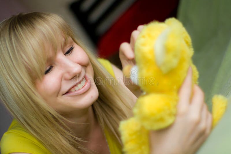 Girl with toy-mouse stock photo. Image of smile, bright - 12255454