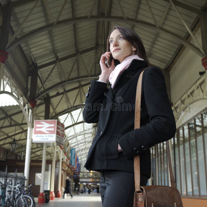 Girl at train station stock image. Image of england, business - 13507081