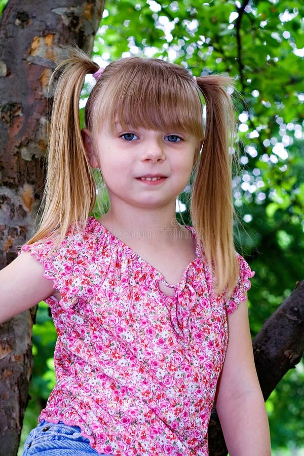 Girl In Tree Picture. Image: 2528354