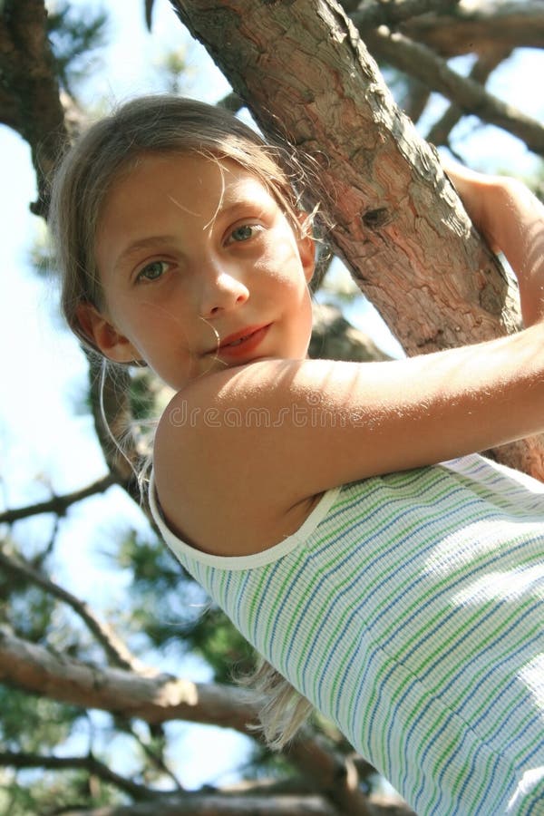 Girl on the tree stock image. Image of person, lovely - 6375183