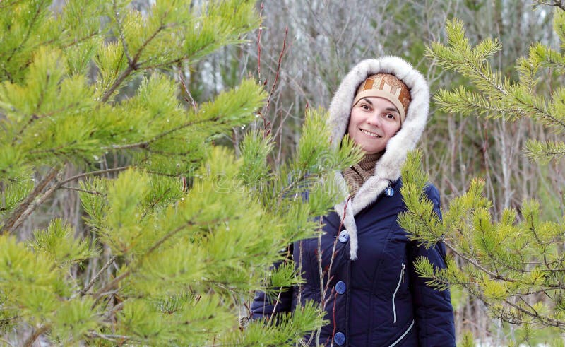 Girl among the trees stock photo. Image of snow, pine - 51345844