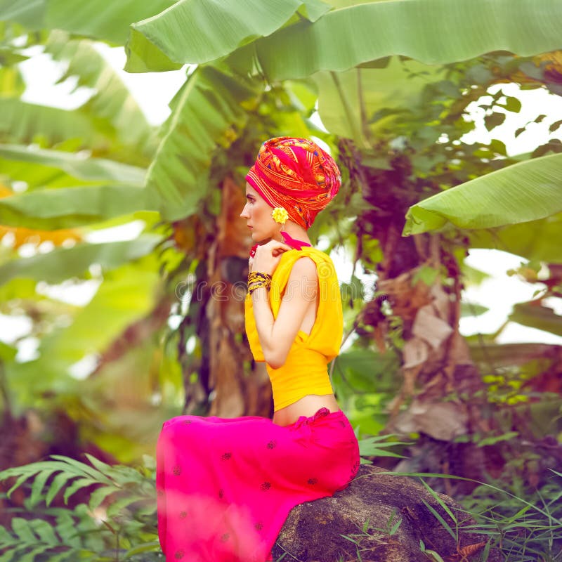 Girl in a tropical jungle stock photo. Image of colorful - 34490684