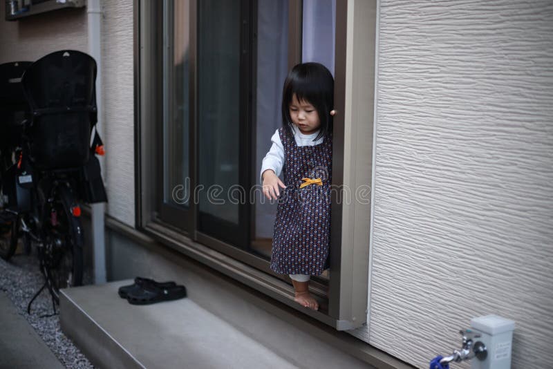 A Girl Trying To Go Out Alone Stock Photo - Image of detached, falling ...