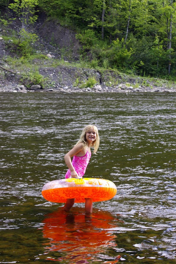 Girl Tubing Lake Photos - Free & Royalty-Free Stock Photos from Dreamstime