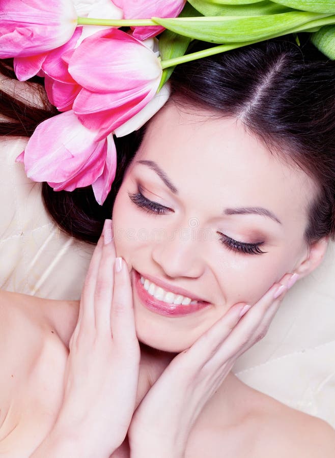 Girl with tulip flowers stock image. Image of human, petals - 23665661