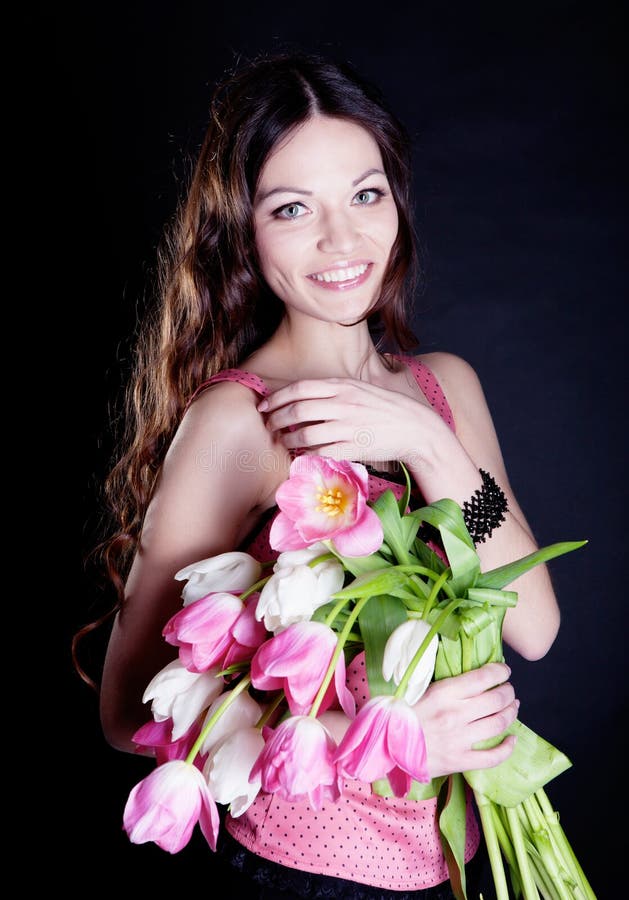 Girl with tulip flowers stock image. Image of freshness - 23665677