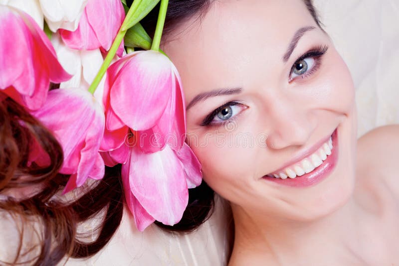 Girl with tulip flowers stock photo. Image of face, human - 23719272
