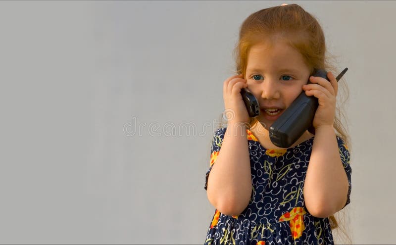 Girl with two phones stock photo. Image of mobile, telephone - 1458856