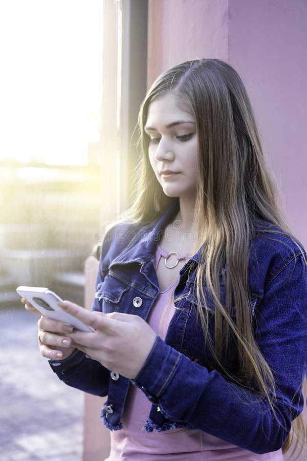 Girl Types Text Message on Smartphone Stock Photo - Image of cellphone ...