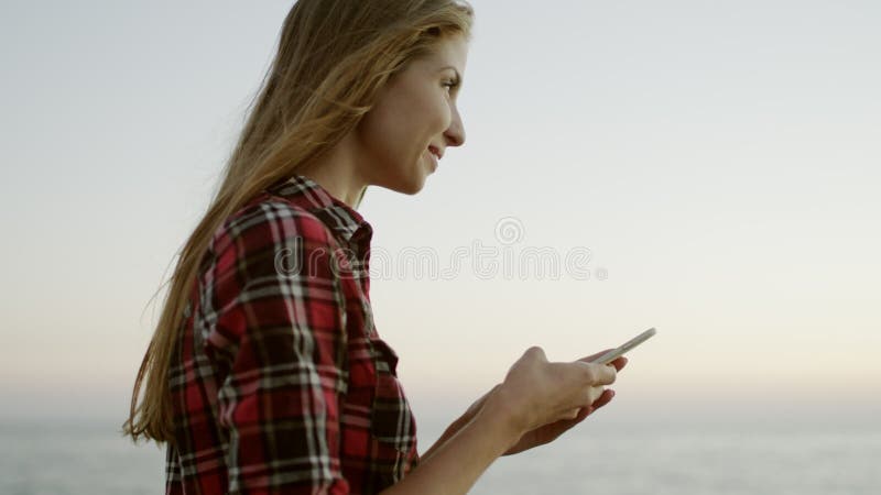 Girl Typing a Message on Sky Background Stock Video - Video of phone ...